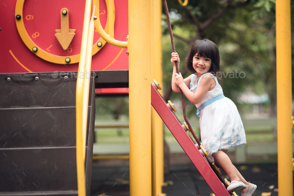 pretty girl doing rock climbing Stock Photo by FamilyStock | PhotoDune