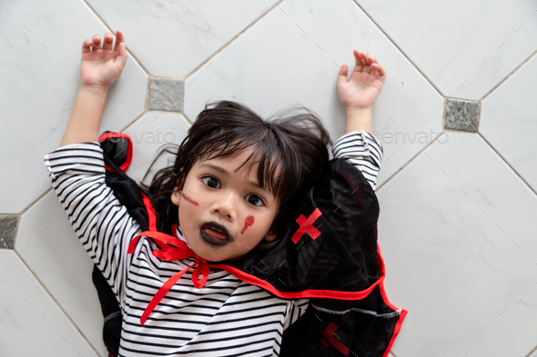 Happy Halloween! The cute little girl in Halloween costume Stock Photo ...
