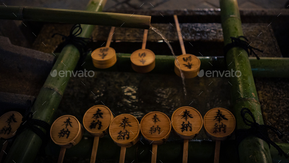 Purification by washing hand at fountain of sanctuary in Japan shinto ...