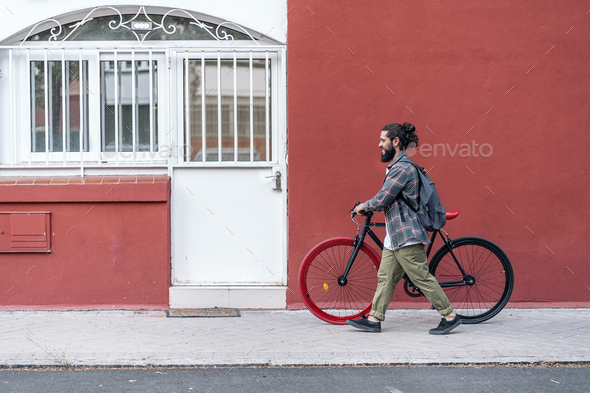 Happy Man Walking with his Bike Stock Photo by nunezimage | PhotoDune