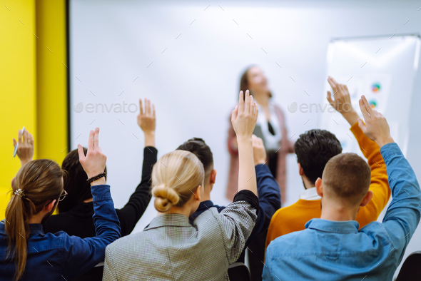 Business people raising hand up to ask question with speaker Stock ...