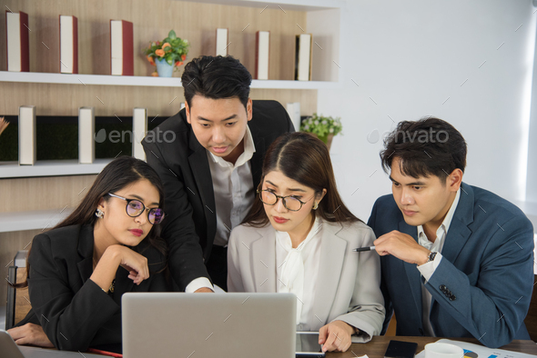 Business Asian people in formal suit meeting and working together in ...