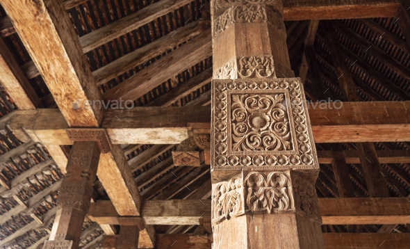 Traditional wood carvings of Embekka Devalaya Stock Photo by motion5