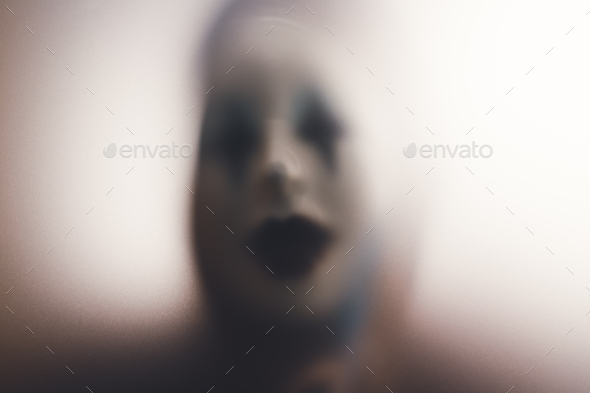 Shadowy figure behind glass - horror background Stock Photo by erika8213