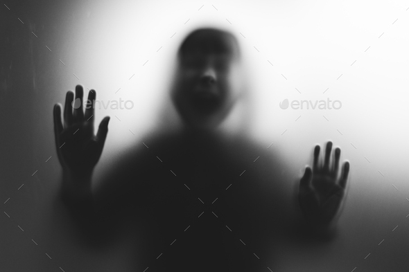 Shadowy figure, child behind glass - horror background Stock Photo by ...