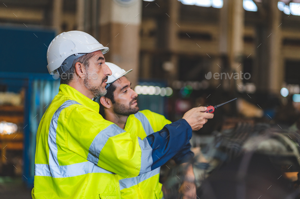 industrial factory with men at work concept, professional engineer ...