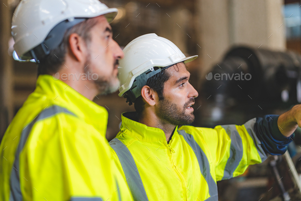 industrial factory with men at work concept, professional engineer ...