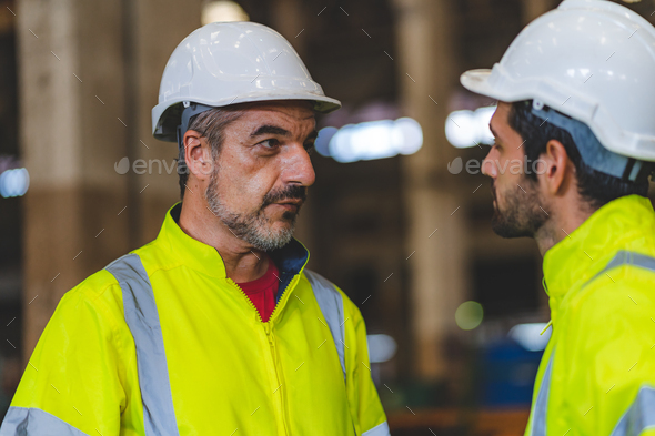 industrial factory with men at work concept, professional engineer ...