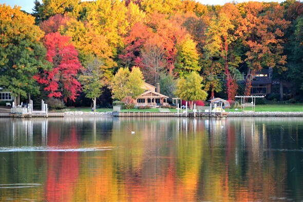 Colorful nature Fall foliage lake reflection Stock Photo by maginnislaura