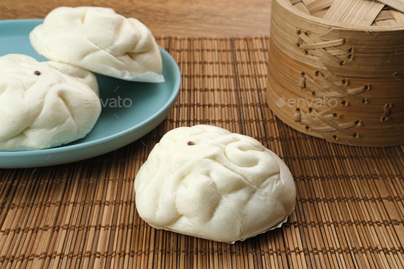 Chinese traditional steamed bun (Bakpao) Stock Photo by tyasindayanti