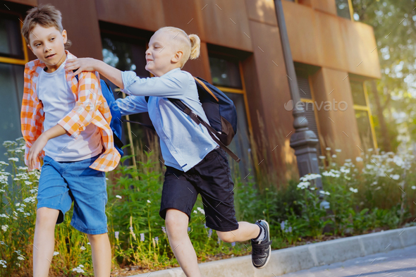 children go to school. Begining of academic year Stock Photo by uraneva
