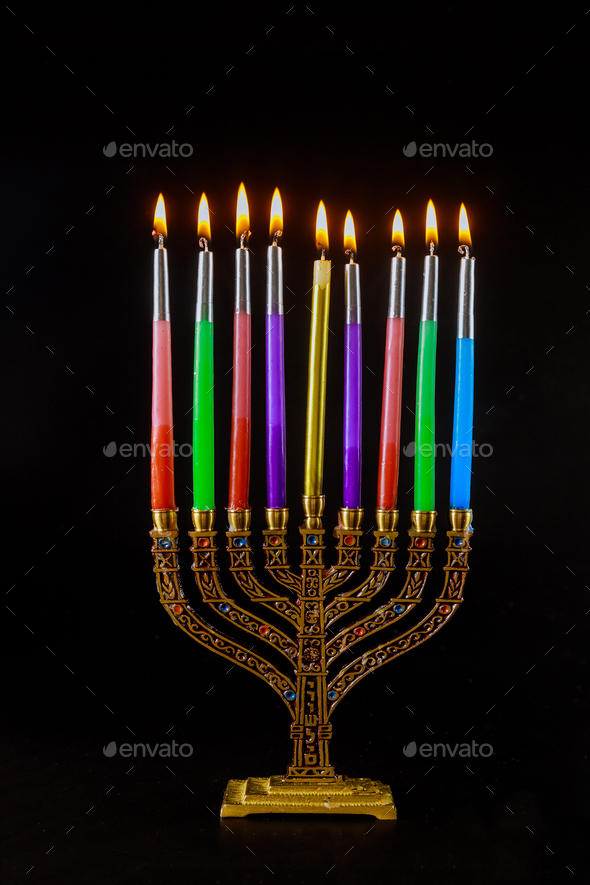 Jewish lights holiday of Hanukkah a burning menorah symbol of Judaism ...
