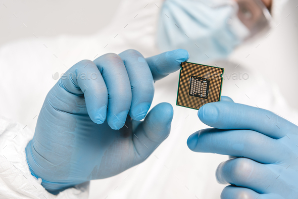 selective focus of microprocessor in hands of scientist Stock Photo by ...