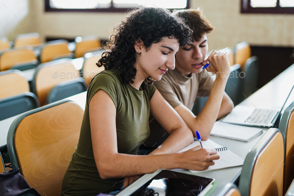 Young students learning together inside school classroom Stock Photo by ...
