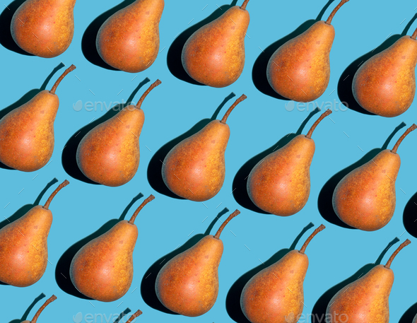 Pear pattern. Yellow and orange Bera pears on a blue background. Ripe ...