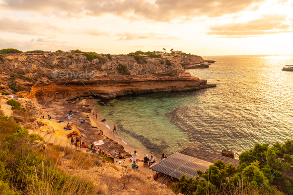 Cala Escondida at sunset in Cala Comte beach on the island of Ibiza ...