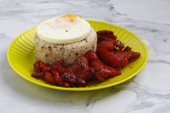 Freshly cooked Filipino food called Tocilog Stock Photo by junpinzon