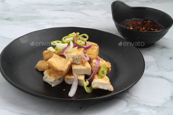 Freshly cooked Filipino food called Tokwa or fried tofu in soy and ...