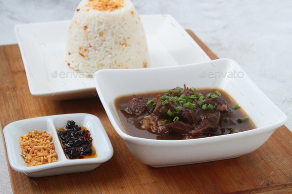 Freshly cooked Filipino food called Beef Pares Stock Photo by junpinzon
