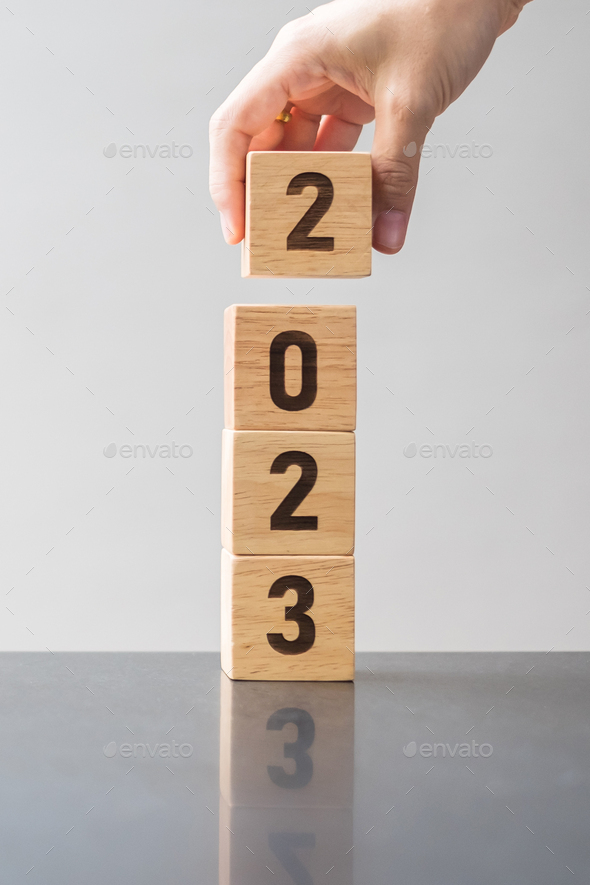 2023 year block on table. Stock Photo by JoPanwatD | PhotoDune