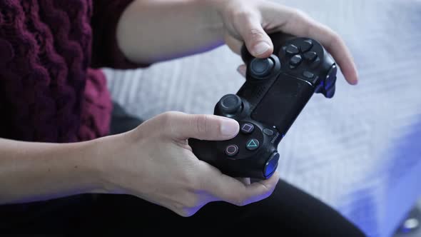 Video game wireless controller joystick. Female hands pressing and ...