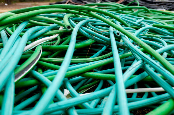 Outer casings of pvc electrical cables, abandoned and discarded, ready ...
