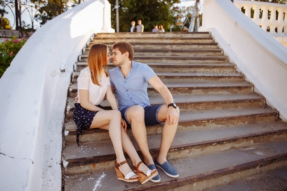 couple in love sitting on stairs Stock Photo by kaplickaya | PhotoDune