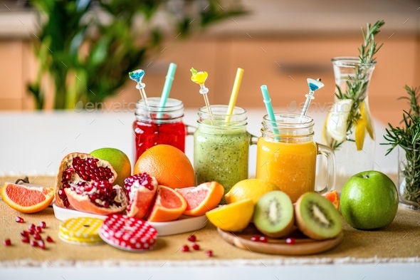 Colorful fruits full of vitamins and fresh healthy juices and smoothie ...
