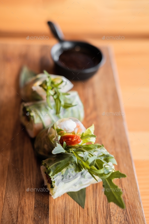 Spring rolls with shrimp, wooden chopsticks and soy sauce. Stock Photo ...