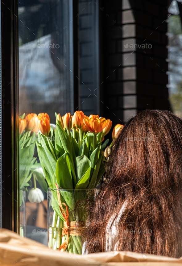 Back view of the brown-haired girl. Faceless photography trend. Stock ...