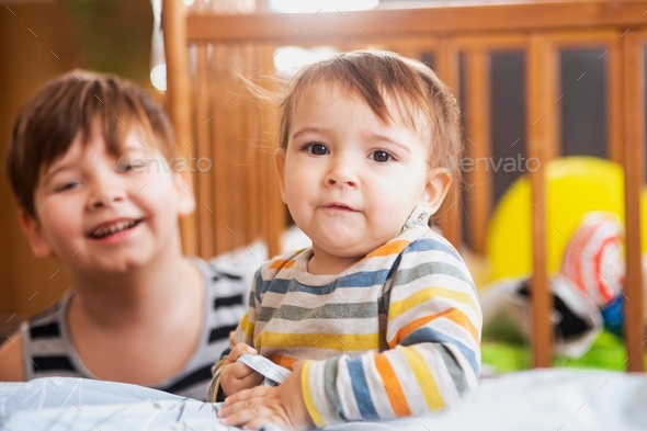 My children playing at home . Cozy day in home. Family day . Happy ...