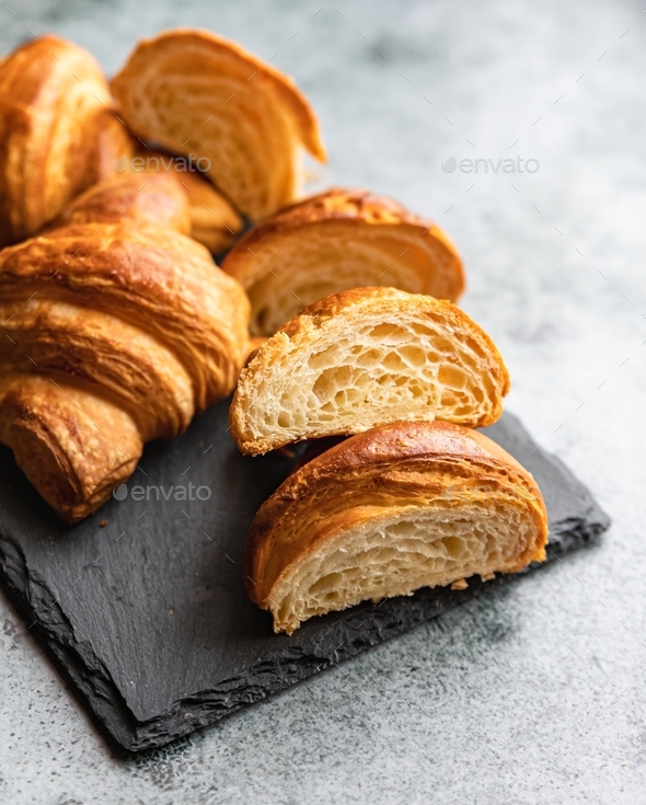 Cut in half croissant with inside texture and thin crisp layers ...