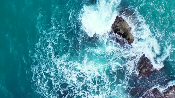 Dangerous sea waves lapping on the rocks near the Philippine coast ...