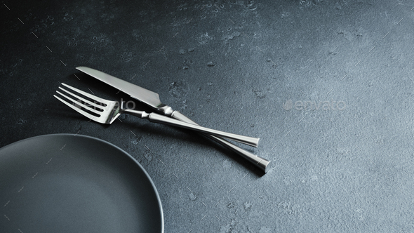 Cutlery and dish on dark textured background. Table setting Stock Photo ...