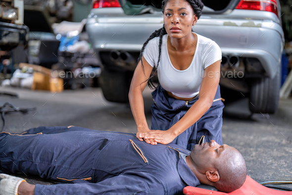 Mechanical guy at car repair shop got accident lay on the floor Stock ...