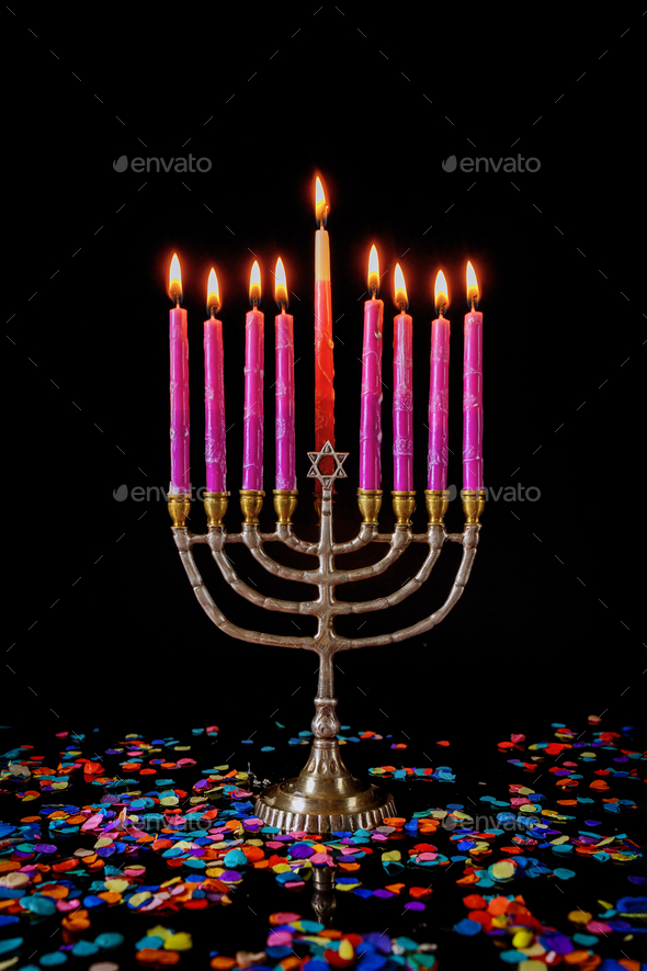 Menorah with pink candles and confetti for Hanukkah jewish holiday ...