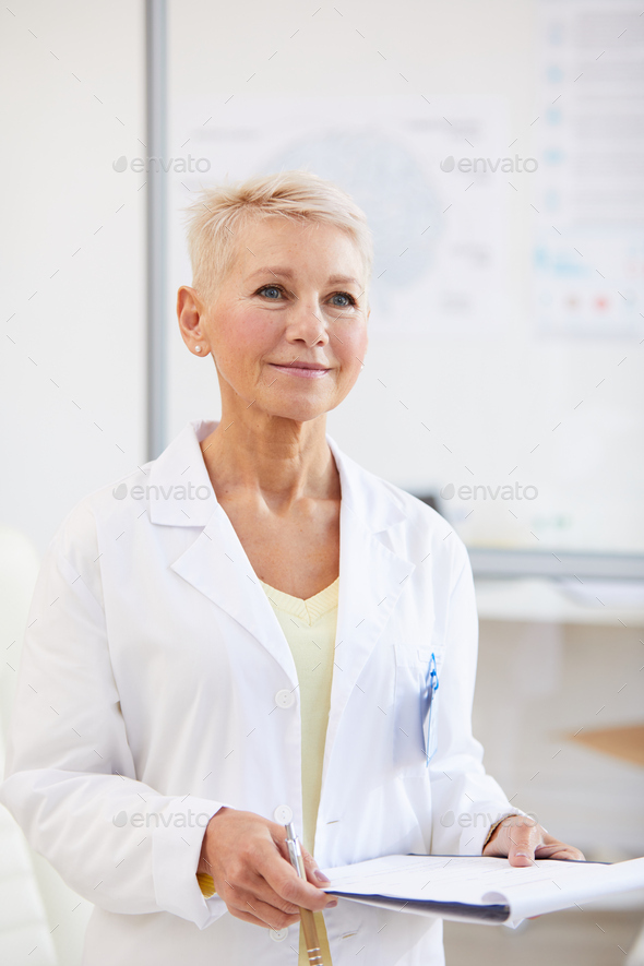 Doctor presenting her medical research Stock Photo by Media_photos
