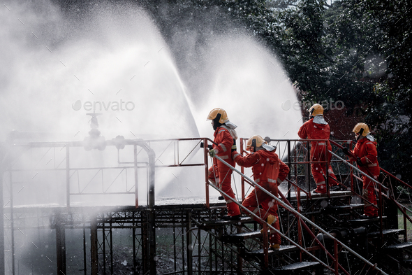 Firefighters safety using twirl water fog type fire extinguisher to ...