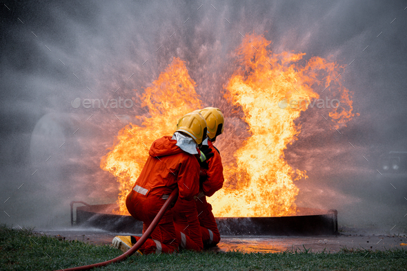 Firefighters safety using twirl water fog type fire extinguisher to ...