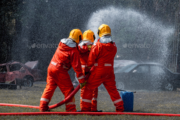 Firefighters safety using twirl water fog type fire extinguisher to ...