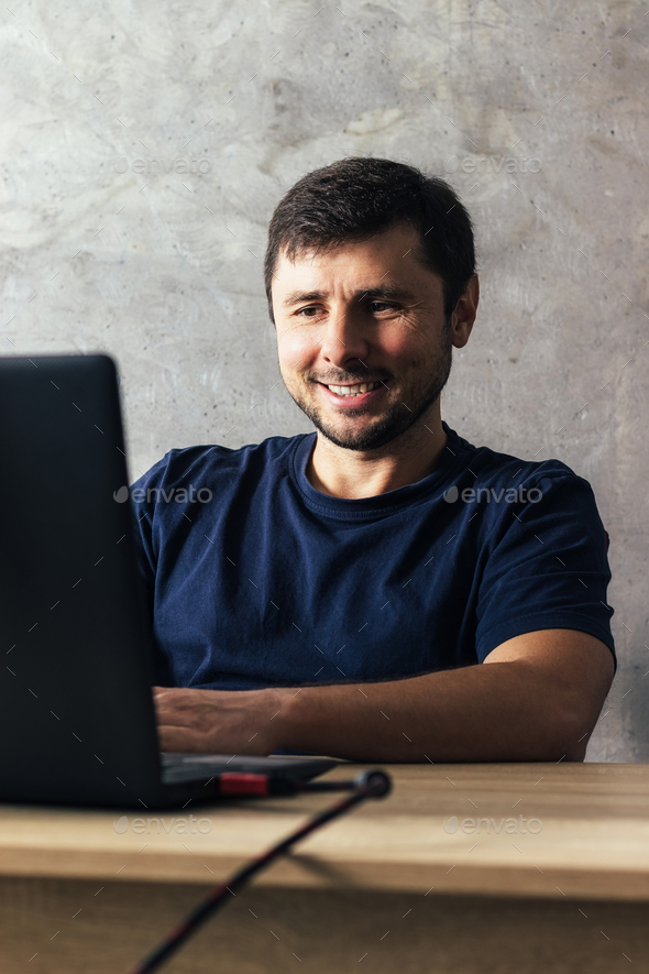 Man at the office desk, working on laptop Stock Photo by Bykfa | PhotoDune