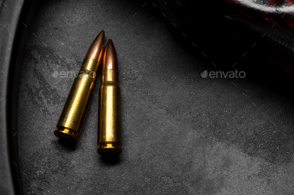 Bullets and Kalashnikov assault rifle Stock Photo by Bykfa | PhotoDune