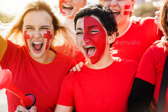 Red sport fans screaming while supporting their team Stock Photo by ...