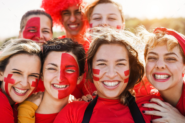 Red sport fans screaming while supporting their team Stock Photo by ...