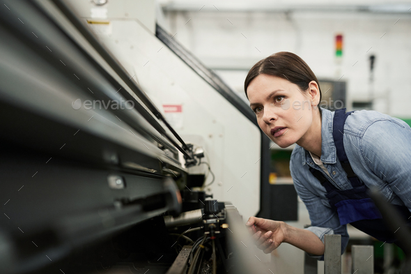 Adjusting lathe machine Stock Photo by Media_photos | PhotoDune