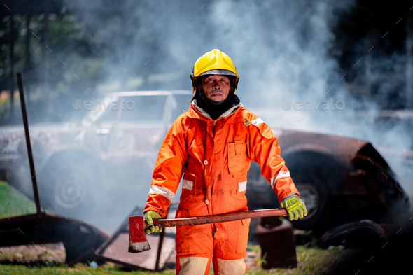 Firefighters safety using twirl water fog type fire extinguisher to ...