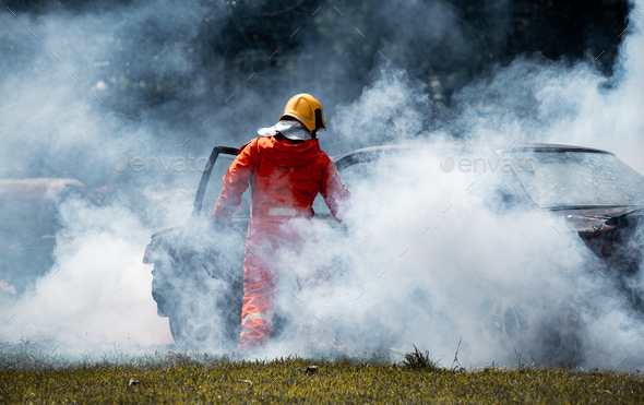 Firefighters safety using twirl water fog type fire extinguisher to ...