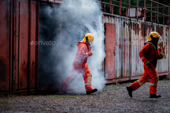 Firefighters safety using twirl water fog type fire extinguisher to ...