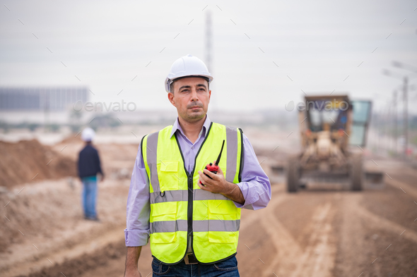 Construction engineer wear safety uniform under inspection and survey ...