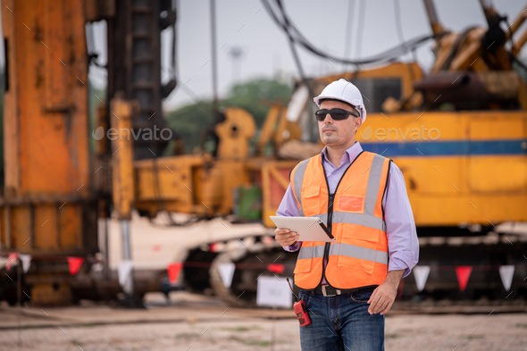 Construction engineer wear safety uniform under inspection and survey ...